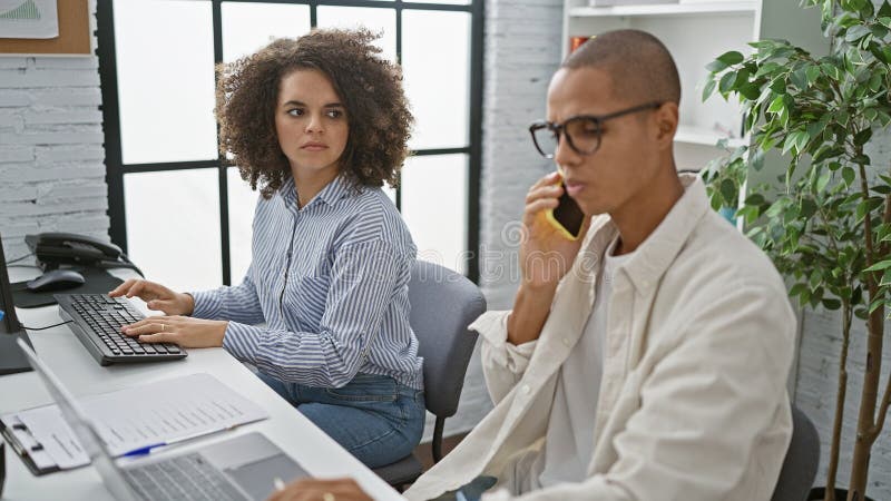 Power Couple at Work, Two Focused Office Workers, Man and Woman ...