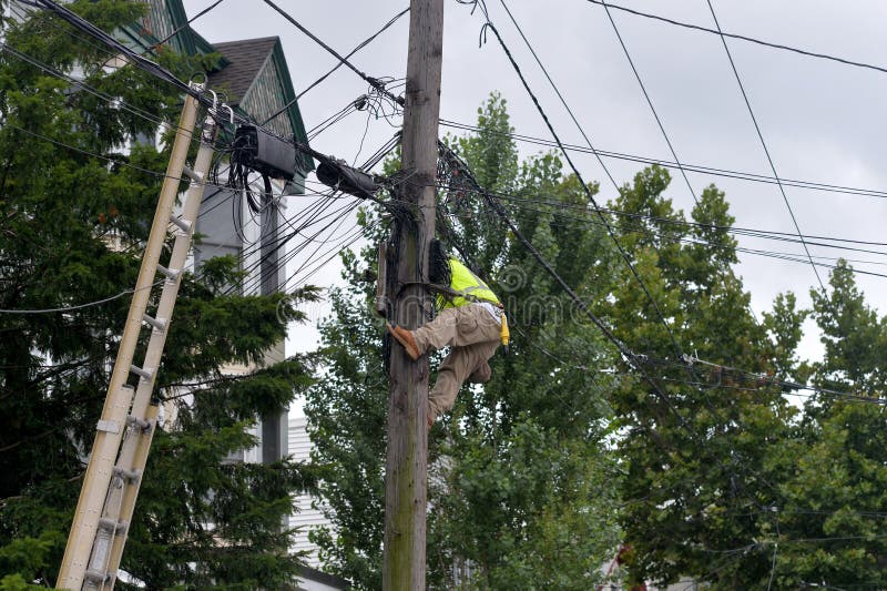 Power Electrician Lineman at Work on Pole Stock Photo - Image of ...