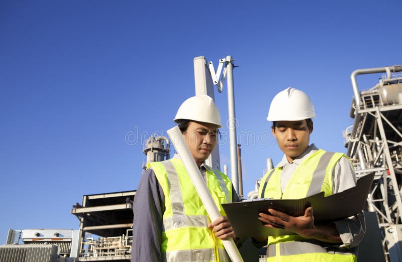 Young Asian Engineer Couple Work Together Using Notebook Computer at ...