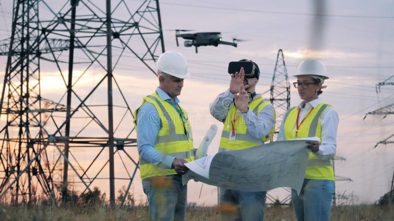 Power Engineers are Exploring a Project with VR-glasses and a Drone ...