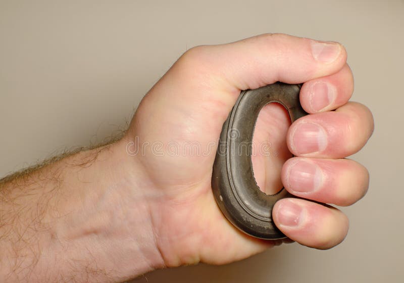 Power expander in hand stock image. Image of isolated - 133138685