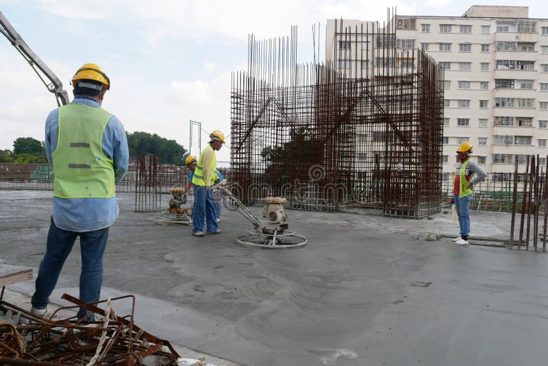 Power Float Works by Construction Workers at the Construction Site ...