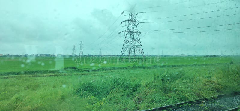 A Power Grid View through Window during Rain Stock Photo - Image of ...