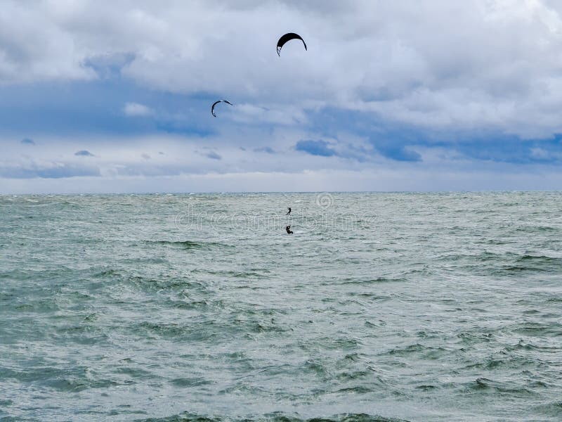 Power Kities with Strong Man on Baltic Sea Stock Photo - Image of ...