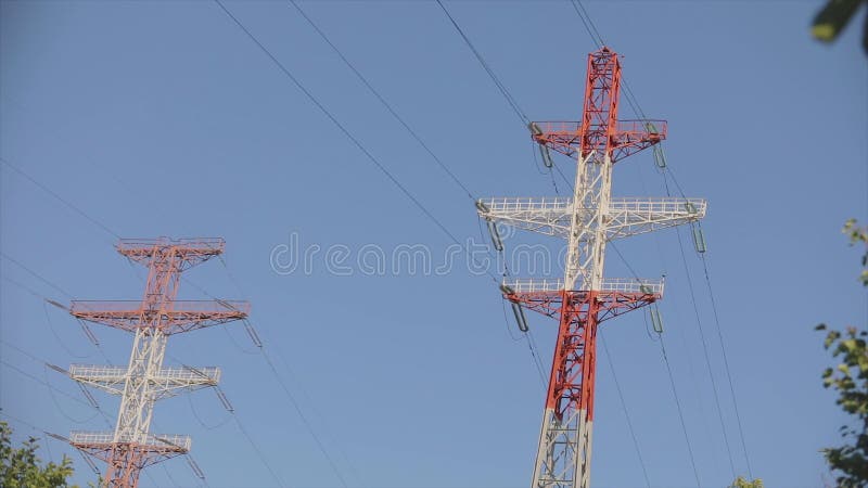 Modern High Voltage Tower. Power Line Against the Blue Sky. High ...