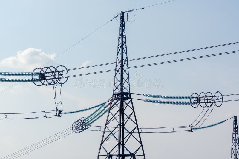 Power Line Close Up Against the Blue Sky. Power Industry Stock Image ...