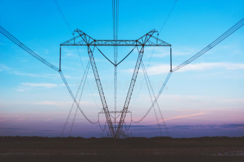 Power line in a field stock image. Image of dusk, outline - 99476661