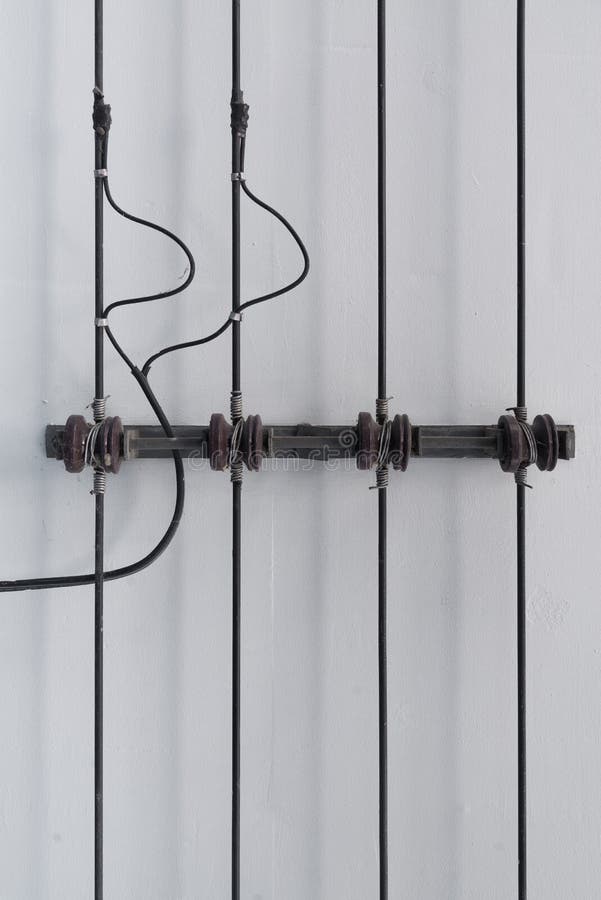 Power Line and Porcelain Insulators with Rack on Ceiling. Stock Photo ...