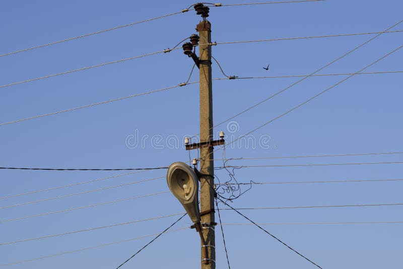 Power Line Post with a Street Lighting Lamp. Blue Sky. Stock Image ...