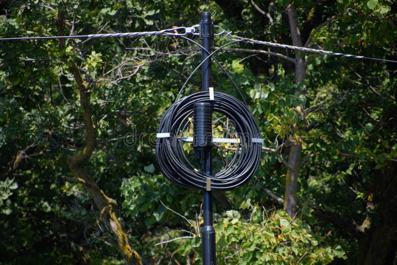 Power Line Post with a Wound Wire. the New Wire is on the Pole Stock ...