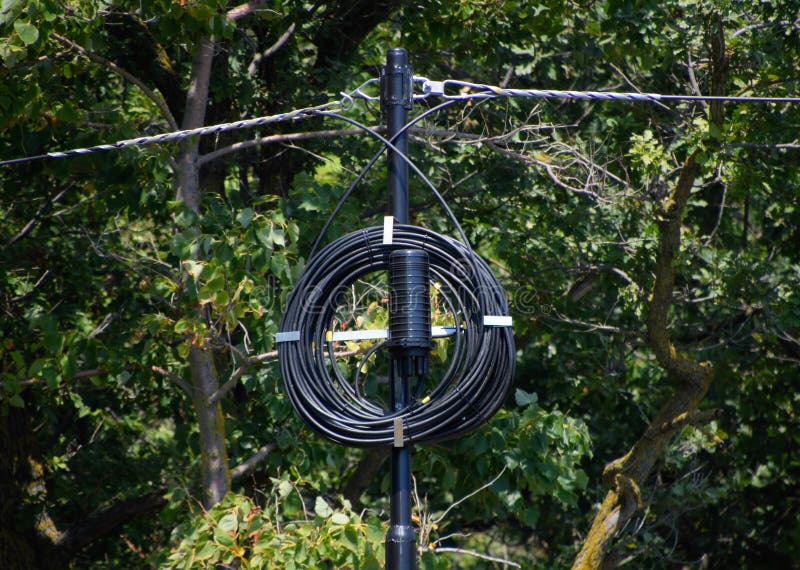 Power Line Post with a Wound Wire. the New Wire is on the Pole Stock ...