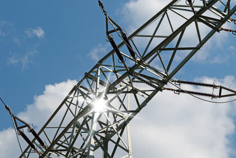 Power Line Pylon in Front of Sky with Clouds Stock Photo - Image of ...