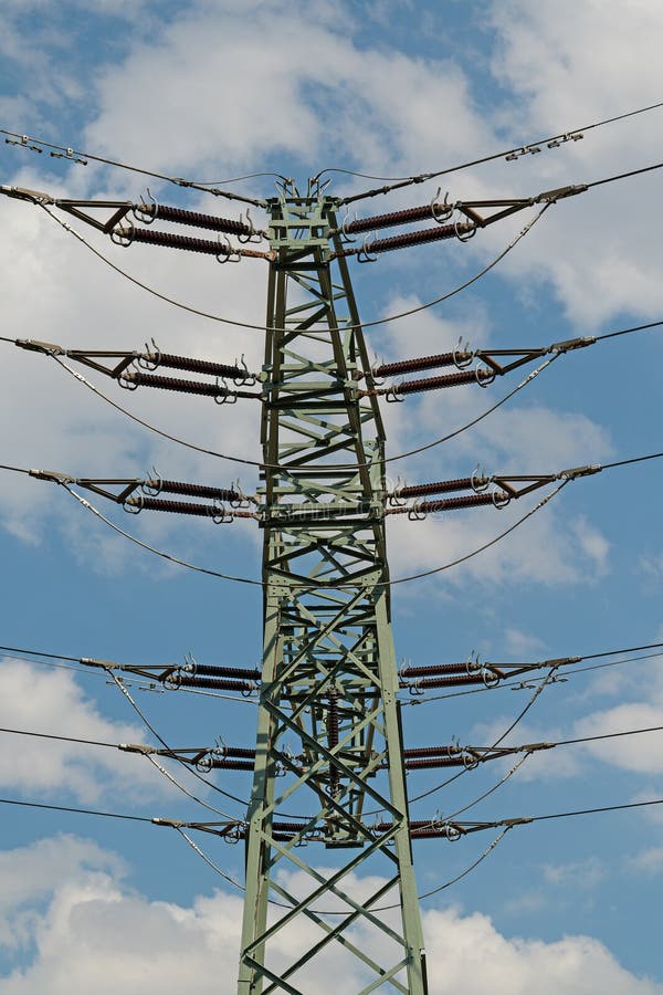 Power Line Pylon in Front of Sky with Clouds Stock Photo - Image of ...