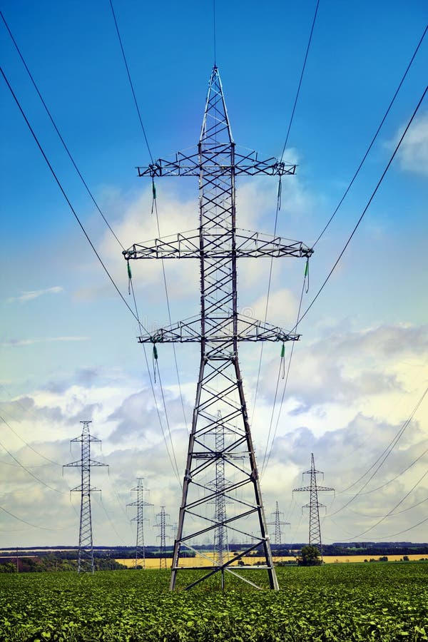 Several Transmission Lines in the Middle of a Field Stock Photo - Image ...