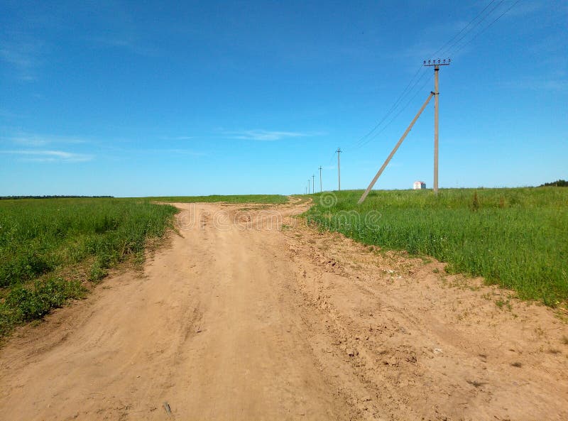 Power Line on the Side of a Dirt Road Stock Image - Image of landscape ...