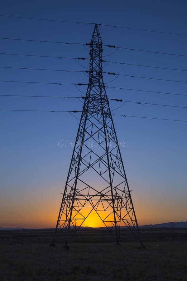 Power Line Tower and Sunset Stock Image - Image of engineering, cable ...