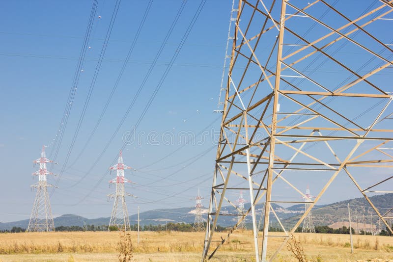 Long Lines of Powerline Towers Stock Photo - Image of group, metal ...