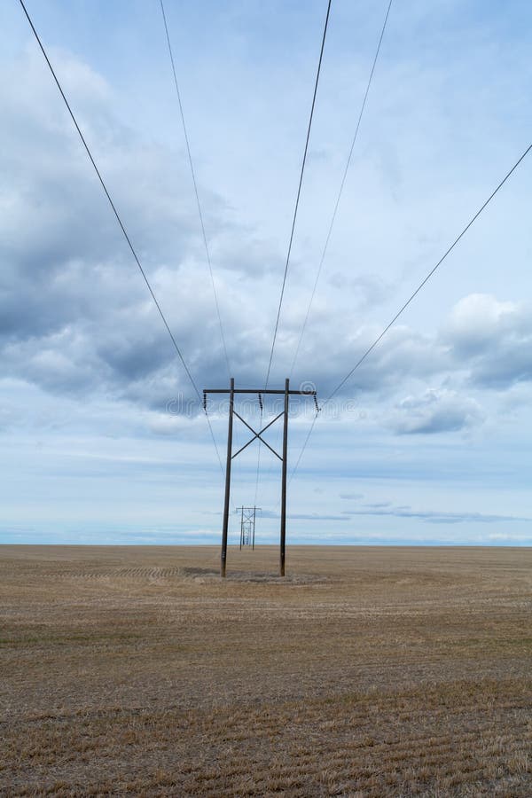 Power line under Clouds stock photo. Image of power, furrows - 71816092
