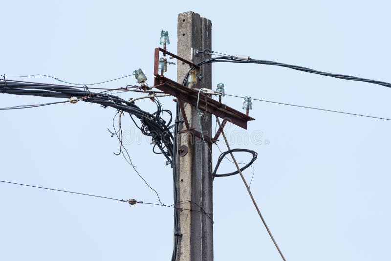 Power Line on a Wooden Post Against the Blue Sky Stock Photo - Image of ...
