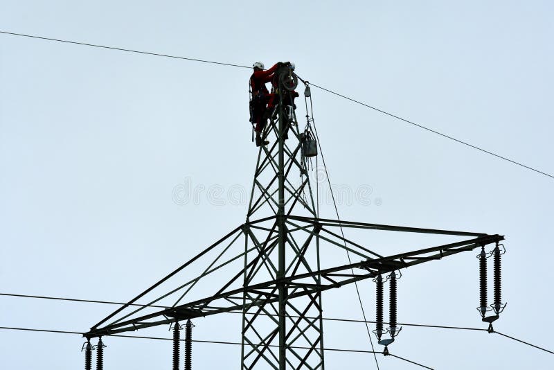 Power line workers editorial stock photo. Image of active - 77074143