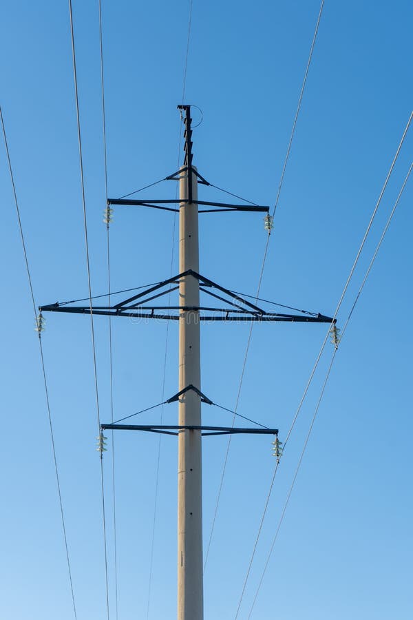 Power Lines Aerial and Power Supply Against the Blue Sky Stock Image ...