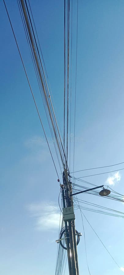 Power lines along the road stock image. Image of vehicle - 356119313