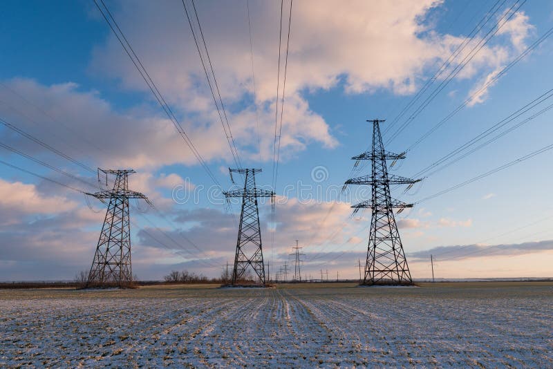 Power Lines during a Beautiful Winter Sunset Stock Photo - Image of ...