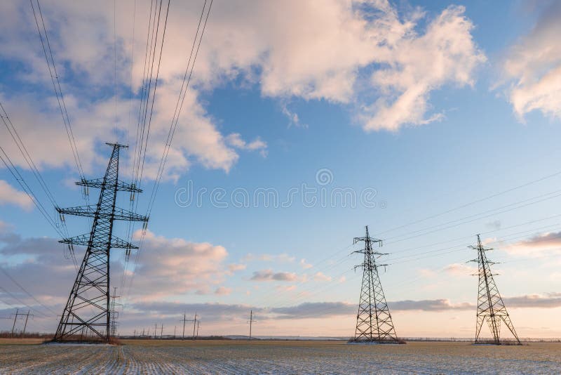 Power Lines during a Beautiful Winter Sunset Stock Photo - Image of ...