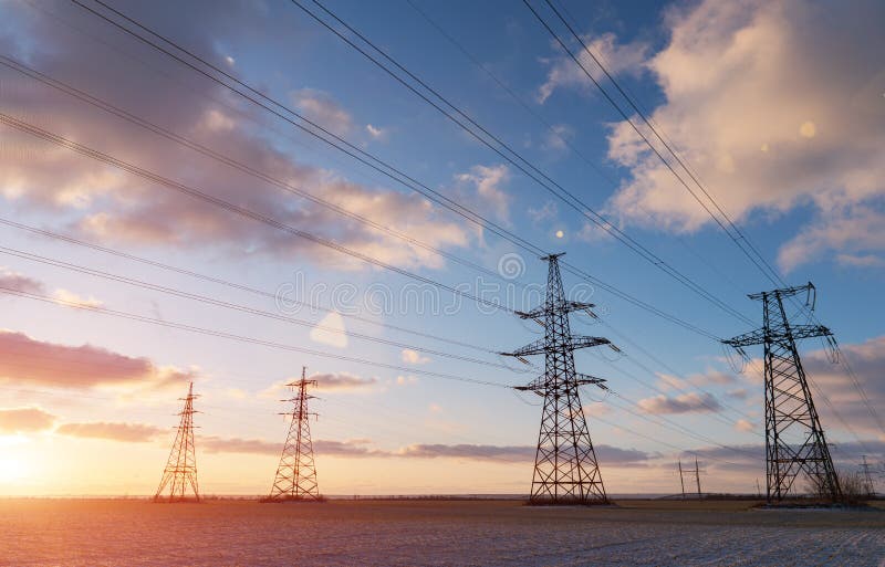 Power Lines during a Beautiful Winter Sunset Stock Photo - Image of ...