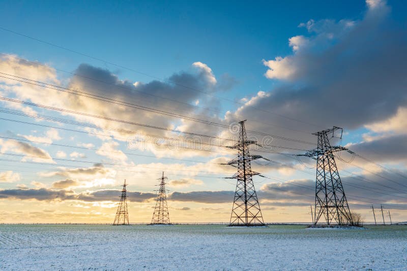 Power Lines during a Beautiful Winter Sunset Stock Photo - Image of ...