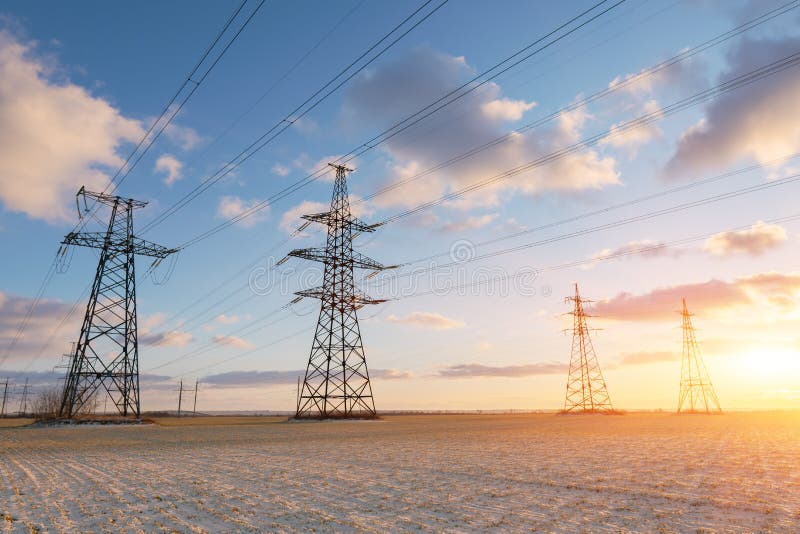 Power Lines during a Beautiful Winter Sunset Stock Photo - Image of ...