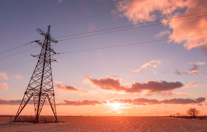 Power Lines during a Beautiful Winter Sunset in Red Shades Stock Photo ...