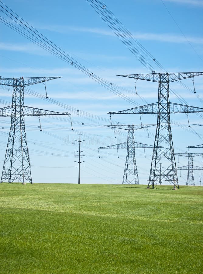 Power Lines with Blue Sky and Green Grass Stock Photo - Image of ...