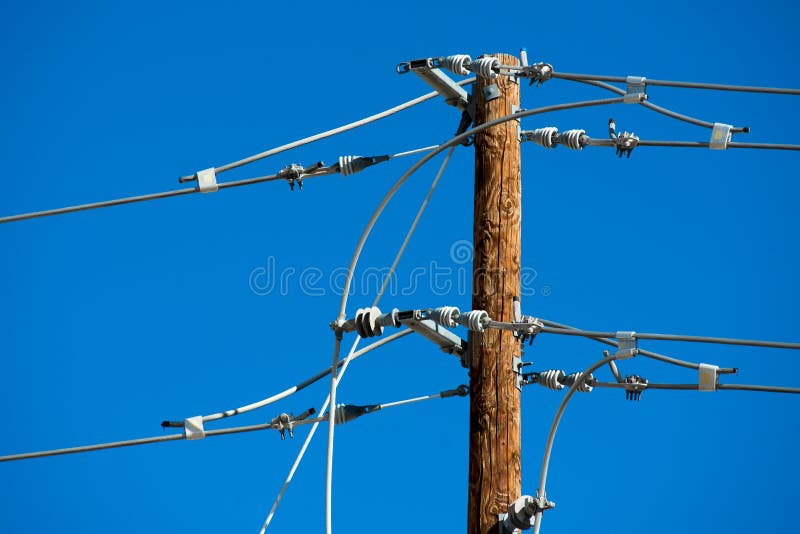 Power Lines and Connections on a Wooden Post Stock Photo - Image of ...