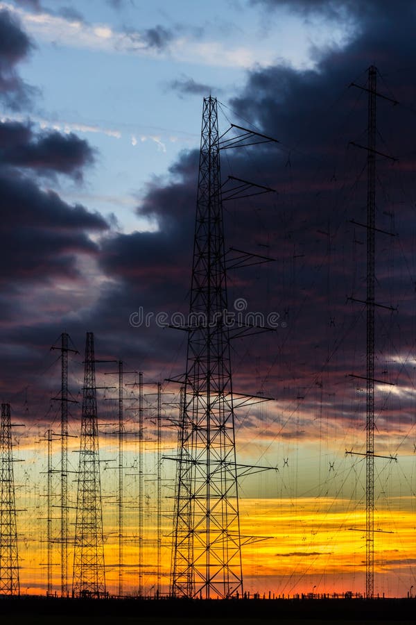 Power Pylon with Broken Lines in the Dusk Stock Photo - Image of blue ...