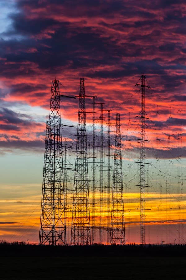 Power Pylon with Broken Lines in the Dusk Stock Photo - Image of blue ...