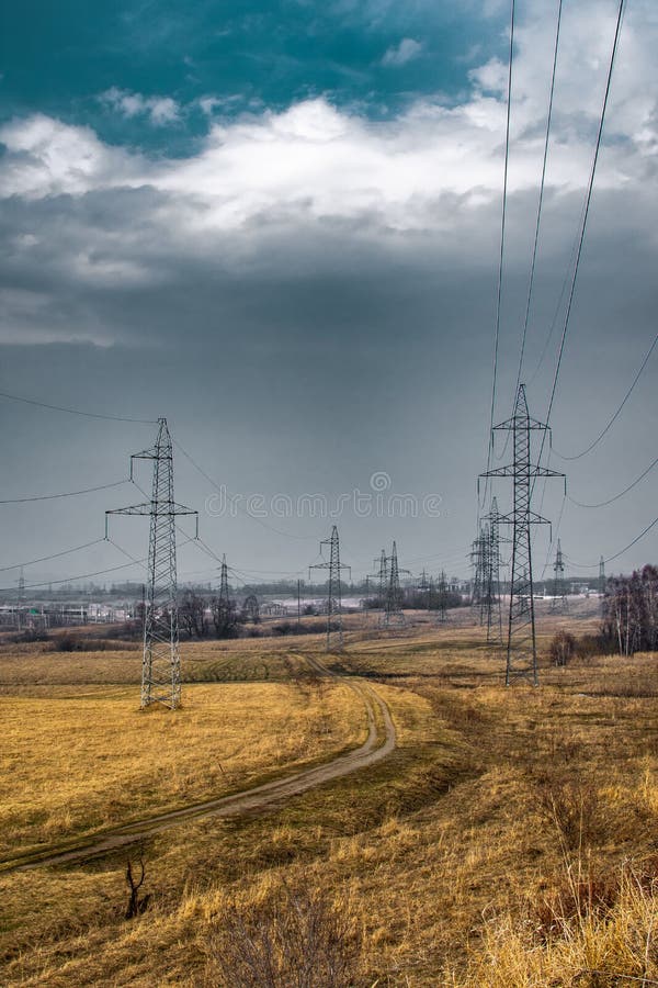 Power lines in a field stock photo. Image of energy - 145895382