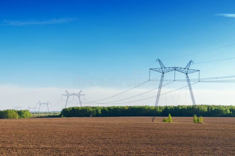 Power Lines in Field. Electrosupply. Stock Image - Image of industry ...