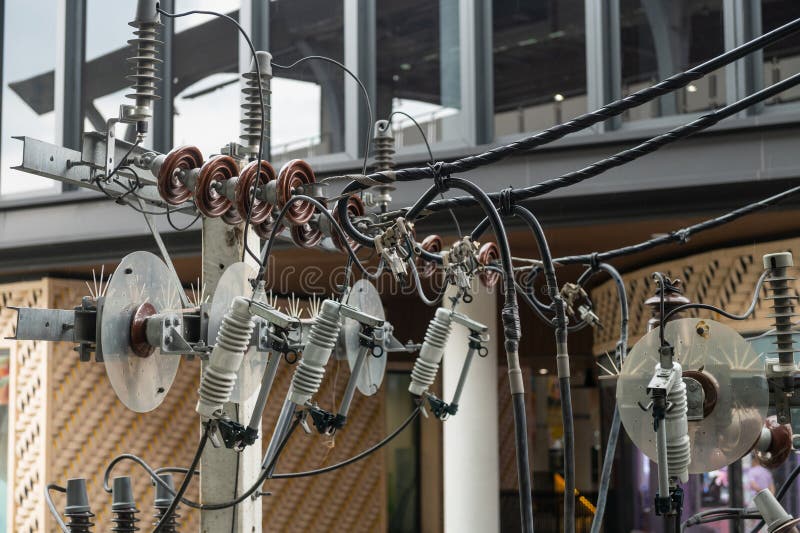 Power Lines and Insulators with High Voltage Fuses Mounted on Electric ...