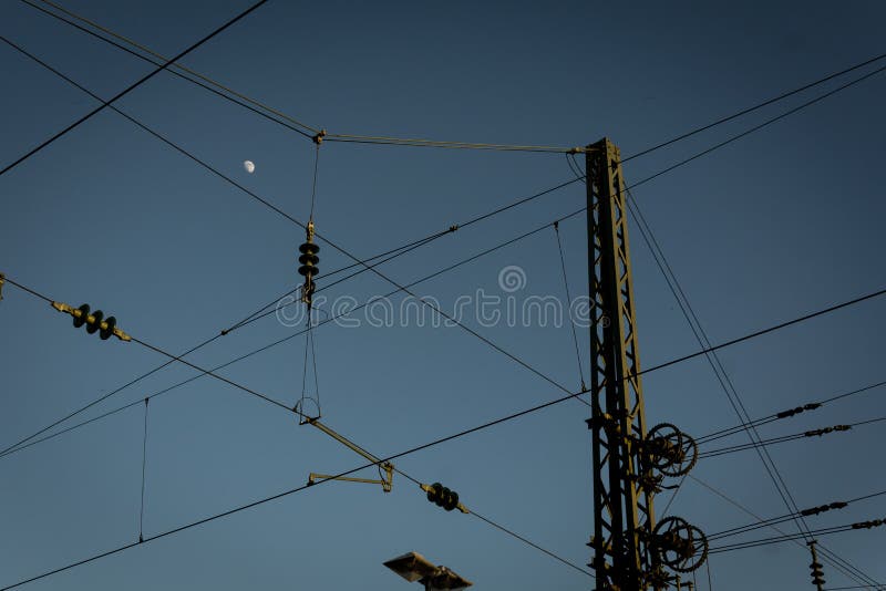 Power Lines and Moon Shape a Nice Structure. Stock Photo - Image of ...
