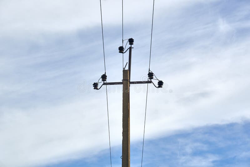 Power Lines, Poles and Poles among the Blue Sky and Clouds. Wires ...