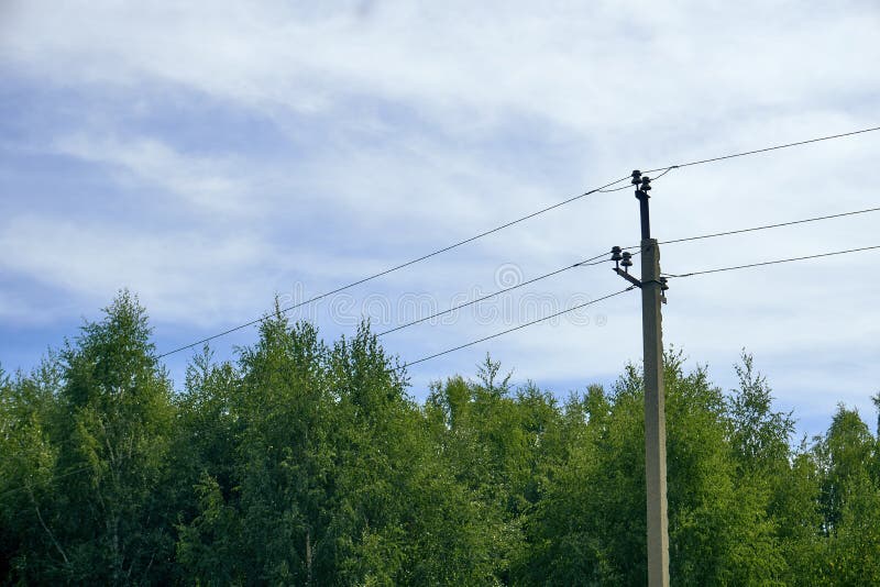 Power Lines, Poles and Poles among the Blue Sky and Clouds. Wires ...