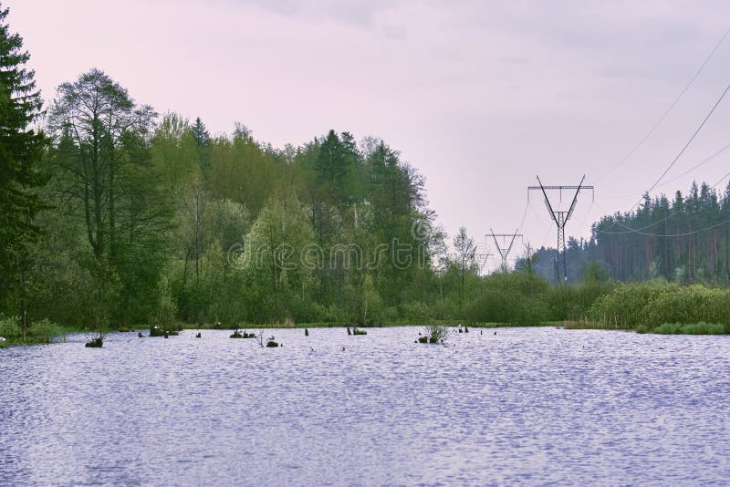 Power Lines on the River Bank Color Stock Photo - Image of weather ...
