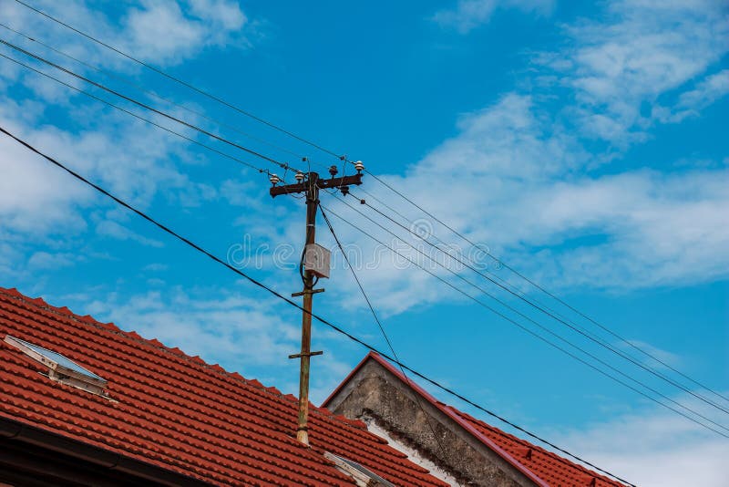 Power Lines on the Roof of the House Stock Image - Image of lines ...