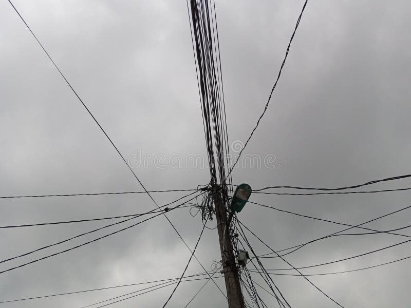 Power Lines Under the Cloudy Sky Stock Photo - Image of amazing, lines ...