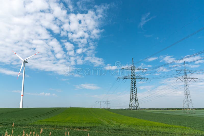 Power Lines and a Wind Turbine Stock Photo - Image of electricity ...