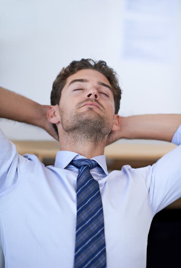 Power Napping for Increased Productivity. a Young Businessman Taking a ...
