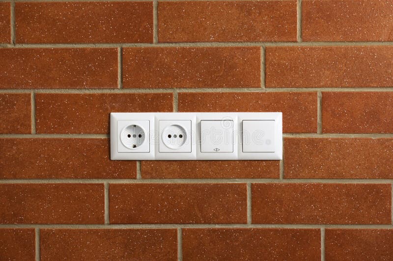 Power Outlets on the Brick Wall Stock Photo - Image of house, macro ...
