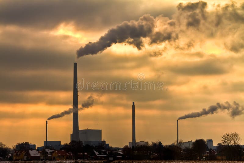 Power Plant with Burning Yellow Sky Behind Stock Image - Image of ...