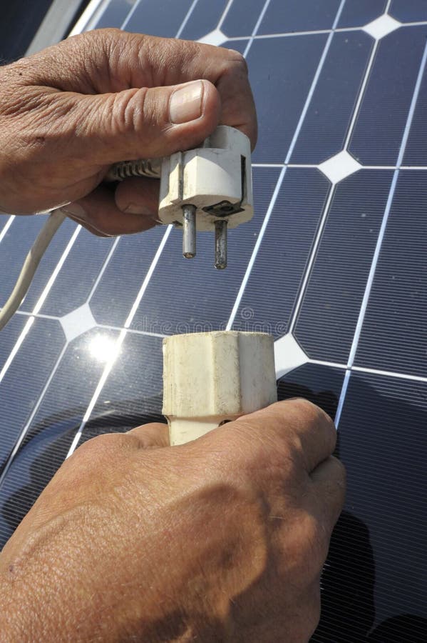 A Power Plug and Solar Panel Stock Photo - Image of photovoltaic ...